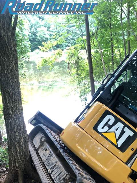 Heavy Towing Operator Expertly Recovers 6000 Pound Mini Excavator | Road Runner Wrecker Service Inc.